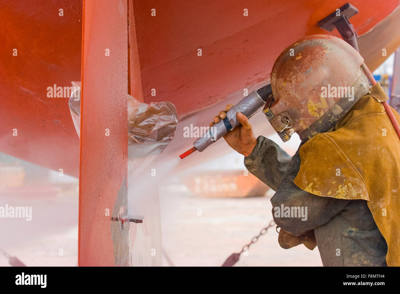 Sailing vessel, being repaired in a boatyard Stock Photo - Alamy