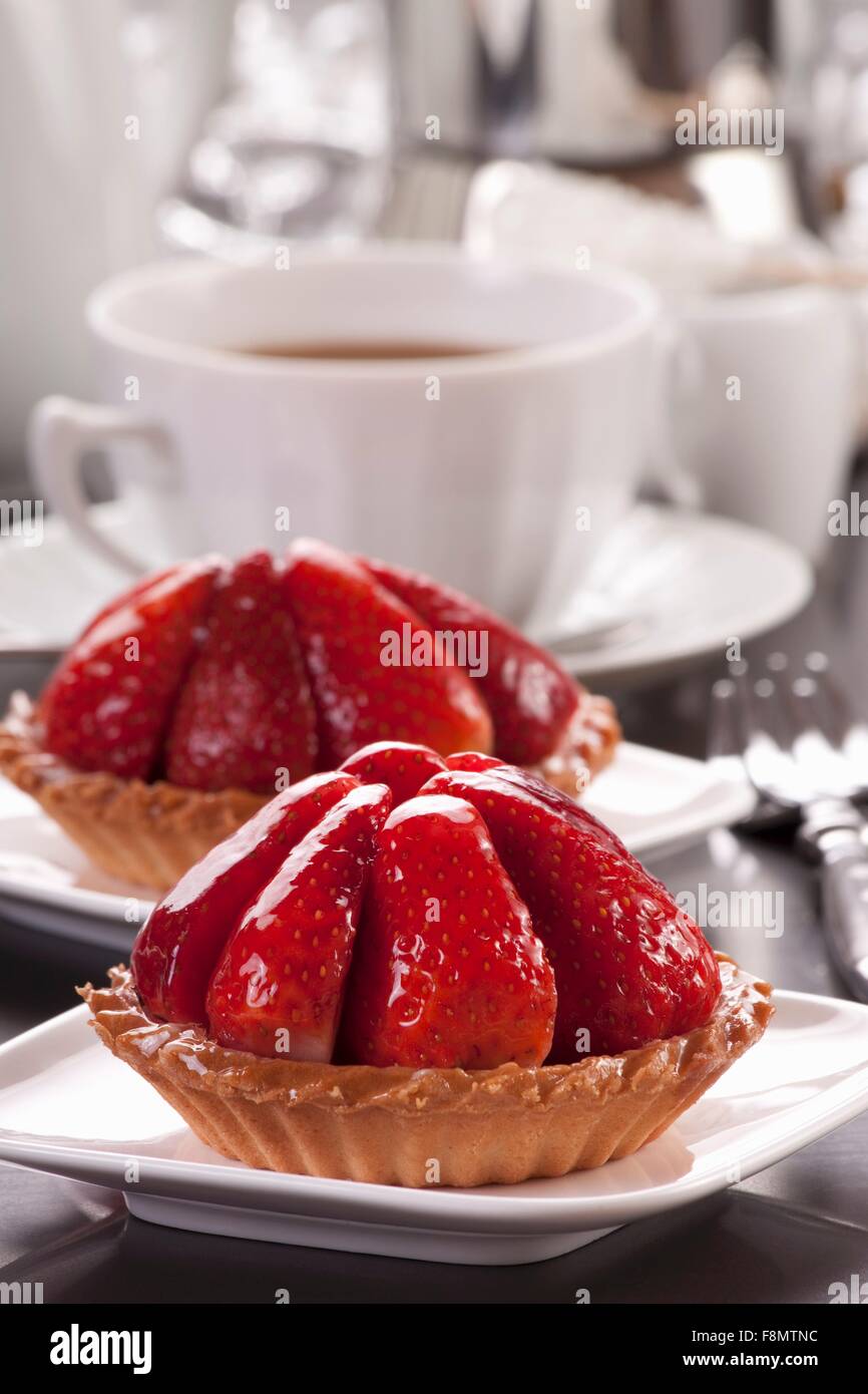Strawberry tartlets with coffee Stock Photo - Alamy