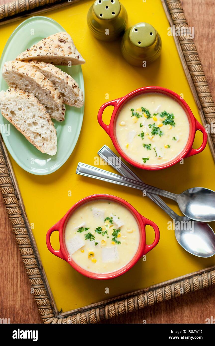 Chicken and corn chowder with bread Stock Photo - Alamy