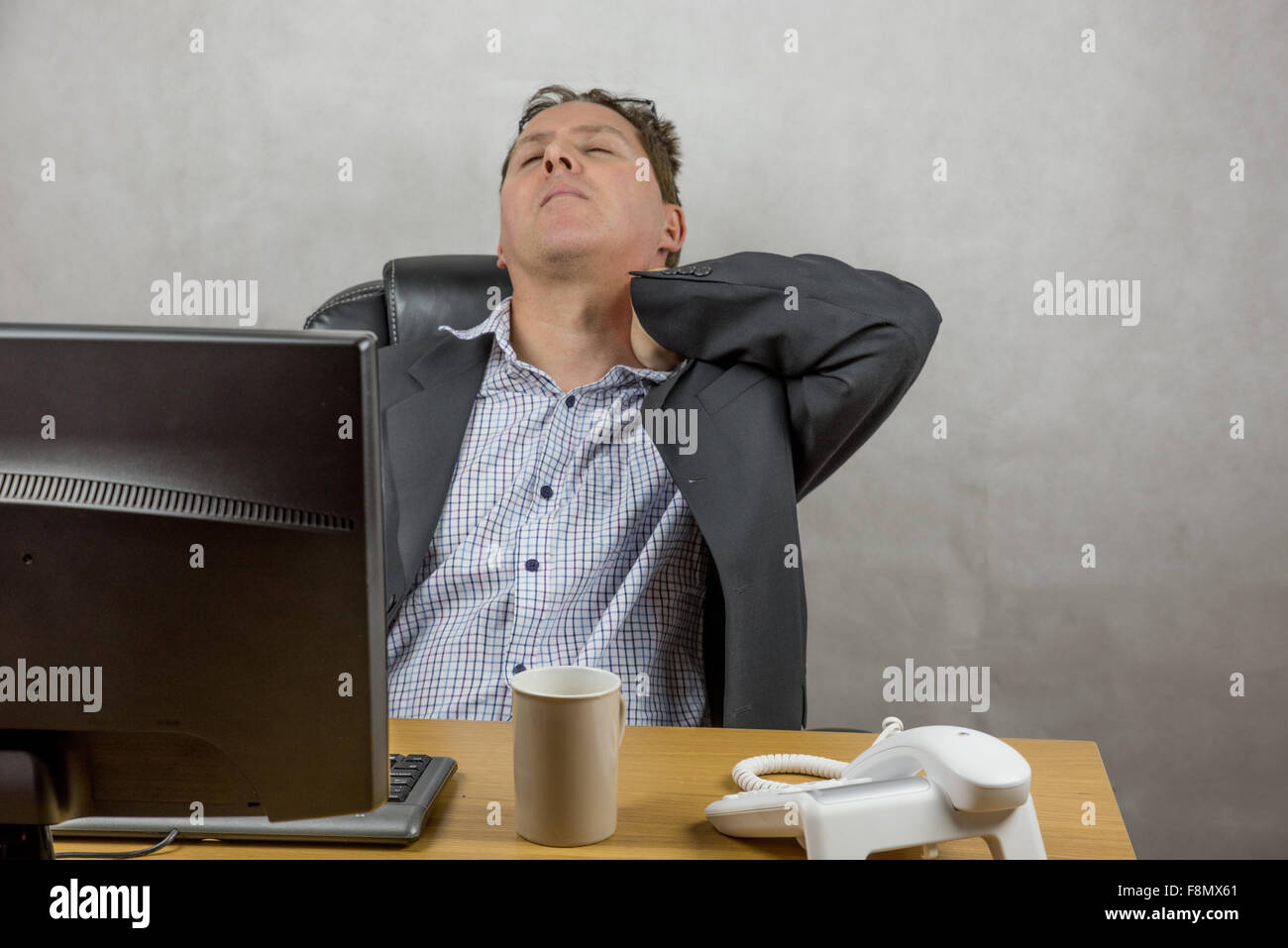 Stiff neck hi-res stock photography and images - Alamy