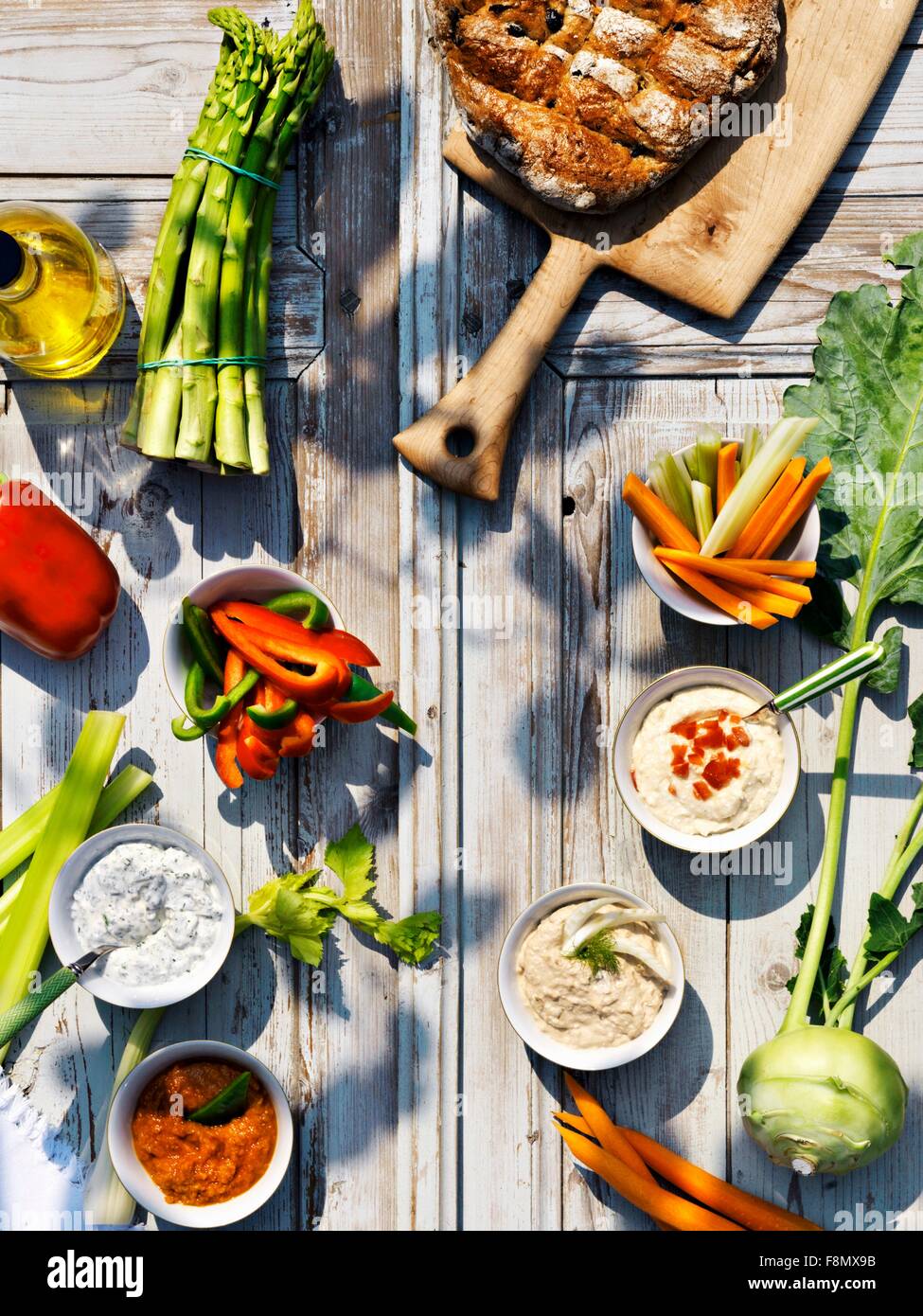 Raw vegetables and assorted dips Stock Photo - Alamy