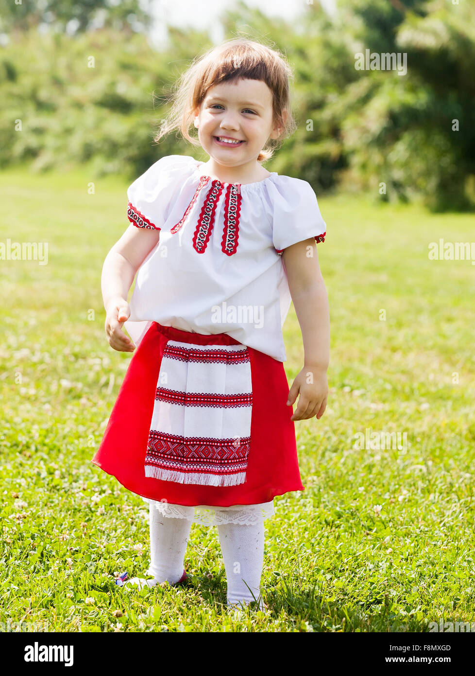 girl in russian folk clothes on meadow Stock Photo - Alamy
