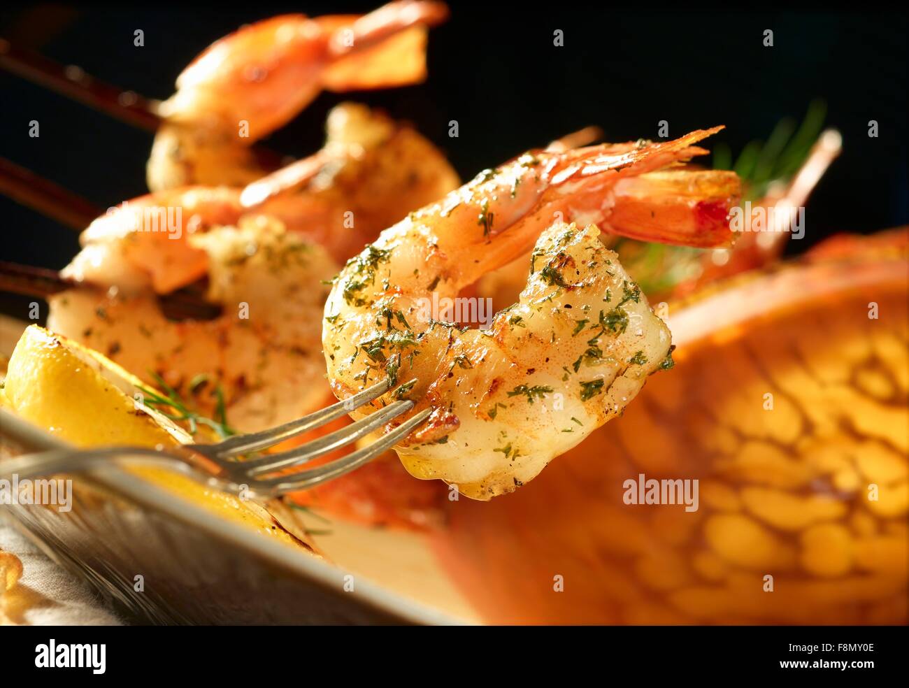 Lemon prawns with dill Stock Photo - Alamy