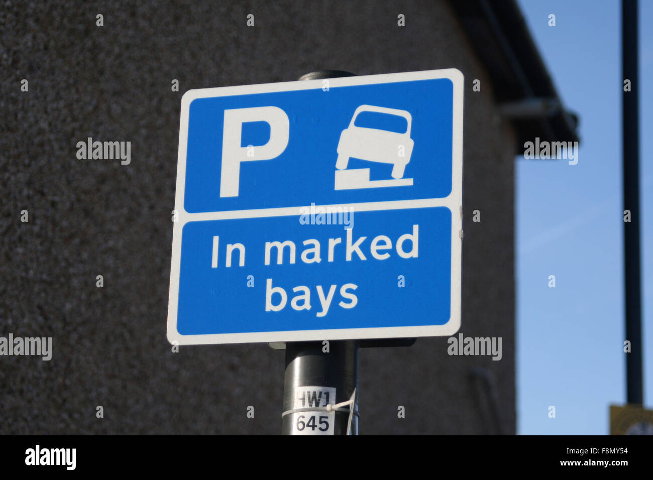 PARK IN MARKED BAY SIGNS Stock Photo - Alamy