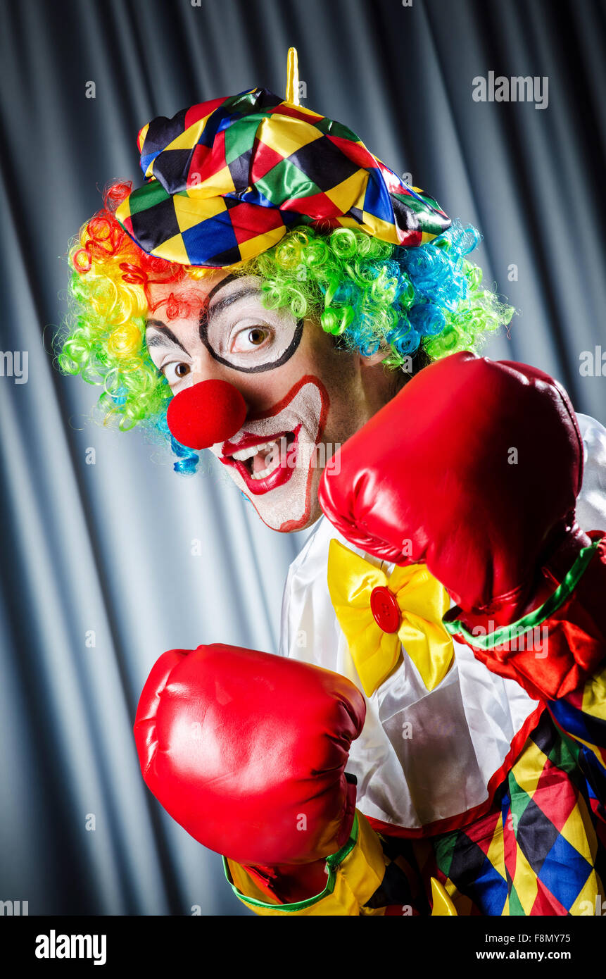 Funny clown in the studio shooting Stock Photo - Alamy