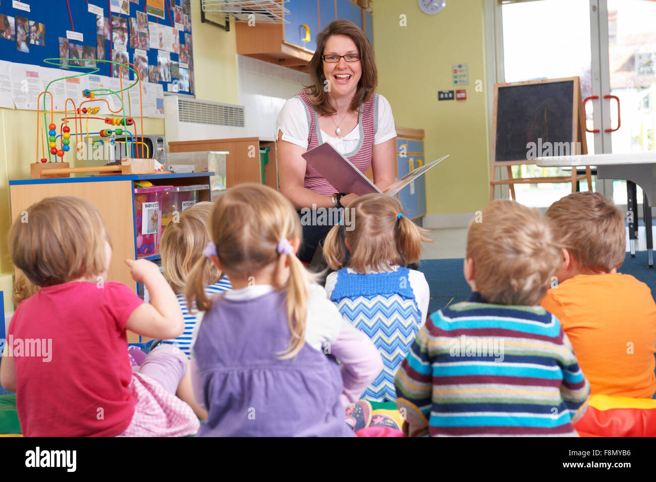 Teacher Reading To Children