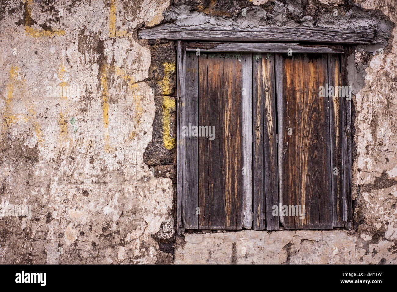 vintage old wood window on dirty rock wall Stock Photo - Alamy