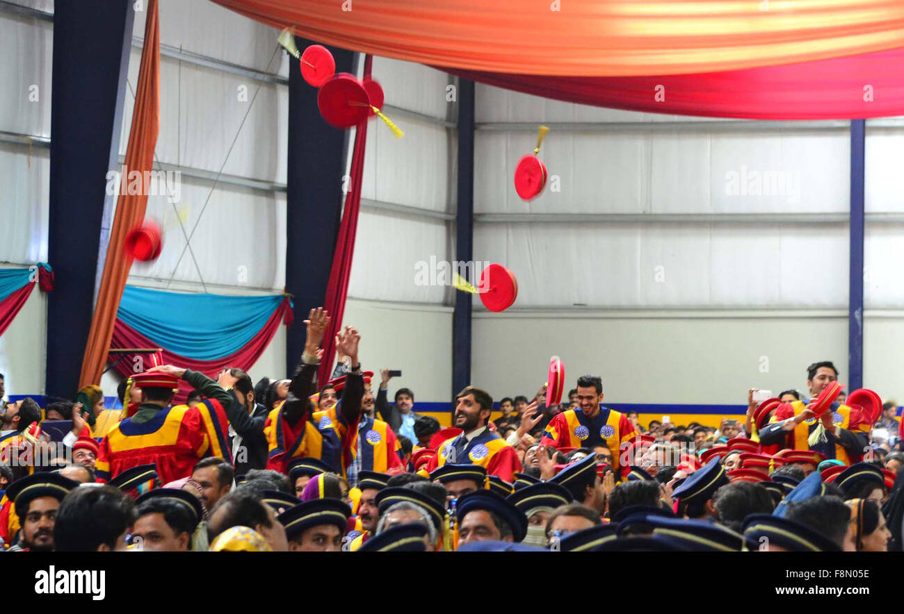 Pakistan. 10th December, 2015. Students throwing caps into air as they ...
