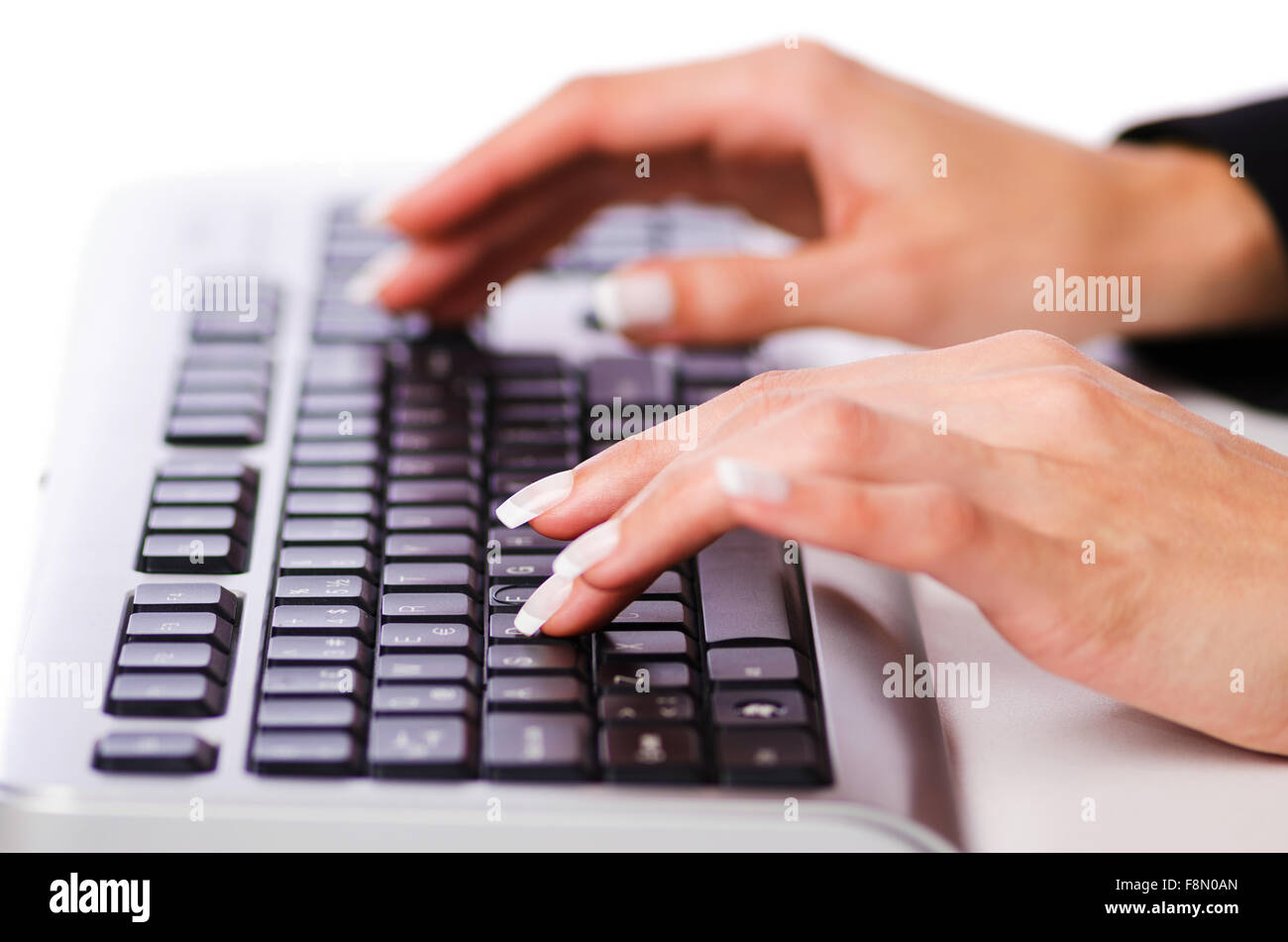 Hands working on the keyboard Stock Photo - Alamy