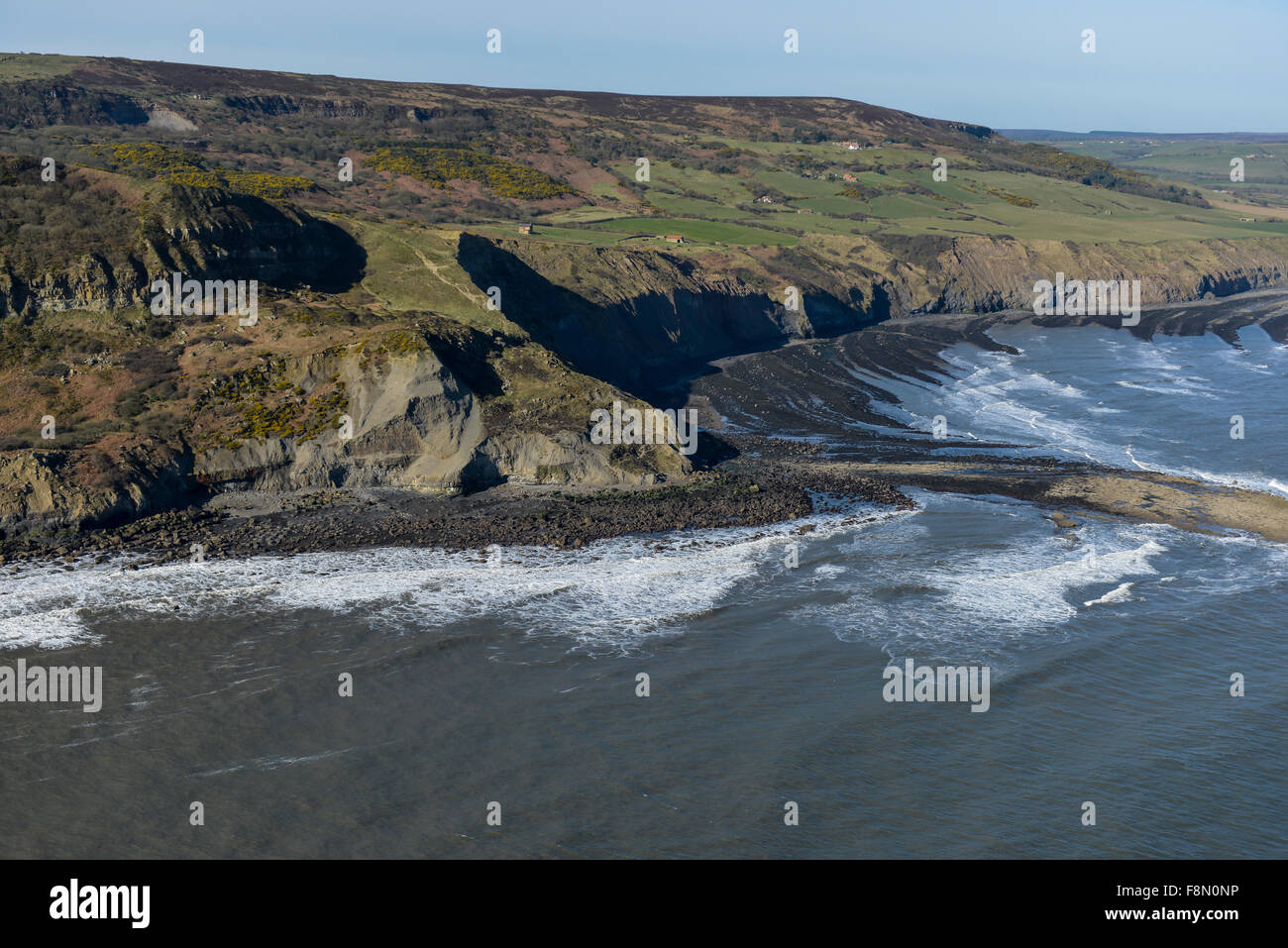 An aerial view of the North Yorkshire coast near Ravenscar and Old Peak ...