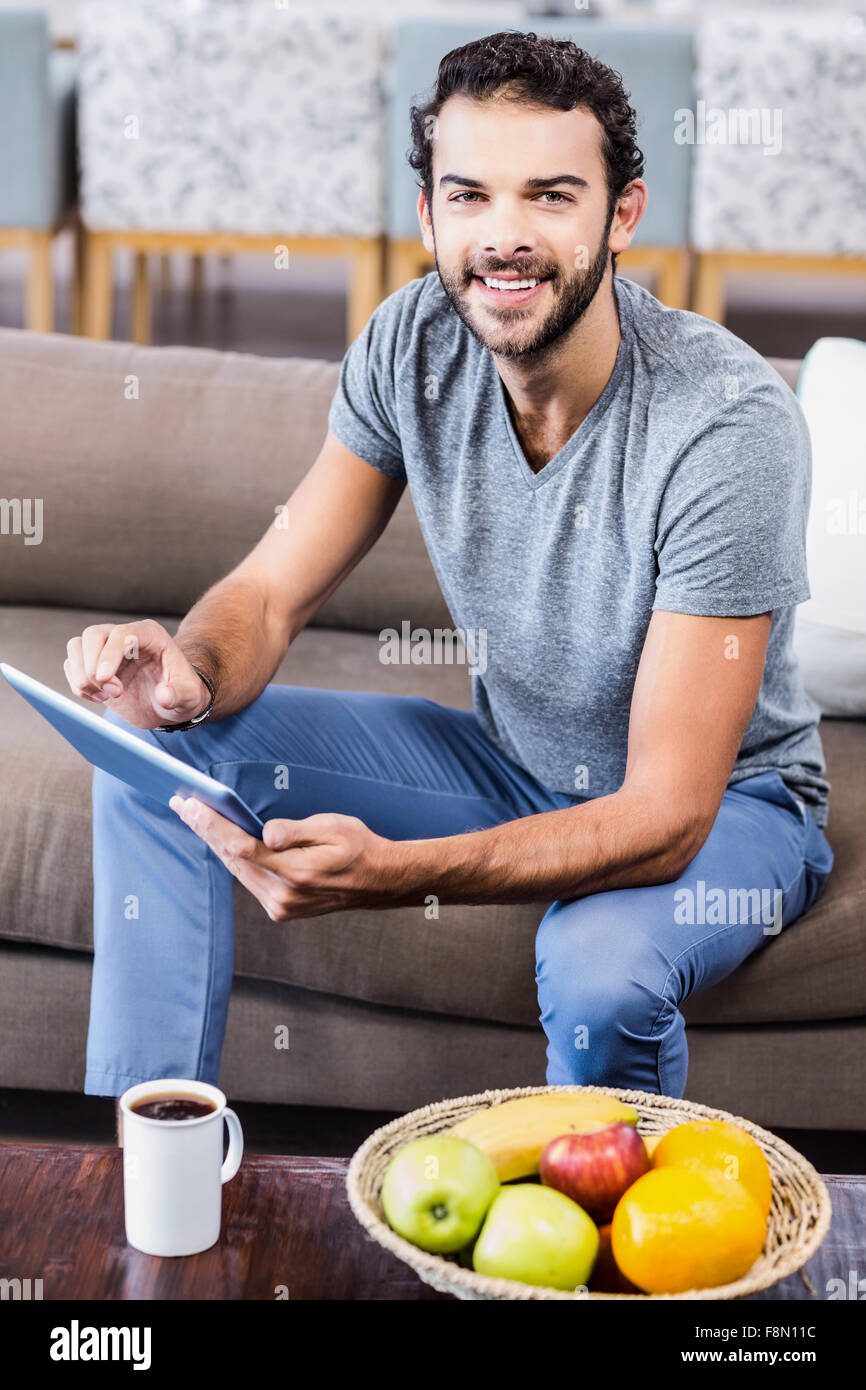 Handsome young cheerful man using hi-res stock photography and images ...