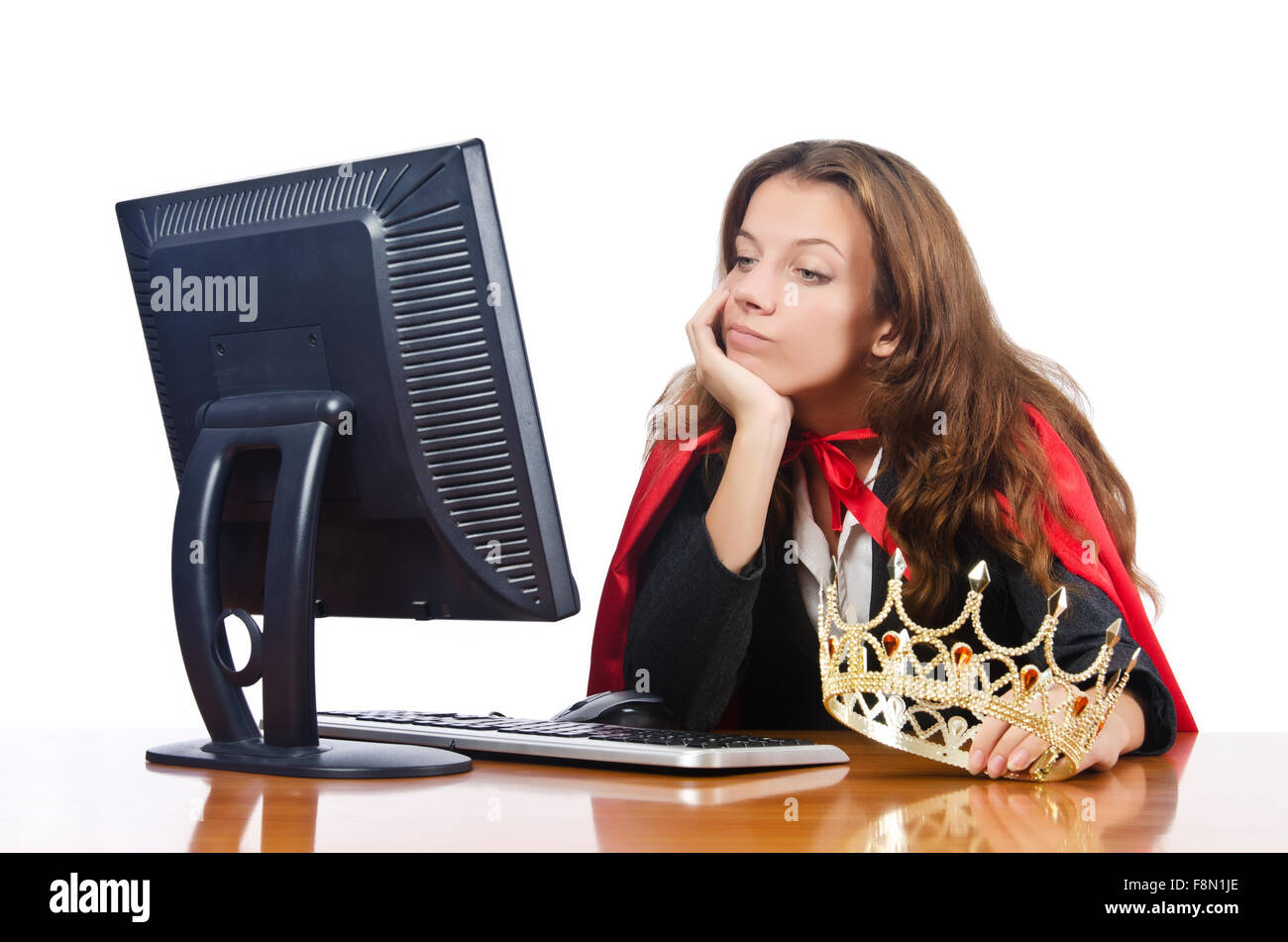 Superwoman worker with crown working in office Stock Photo - Alamy