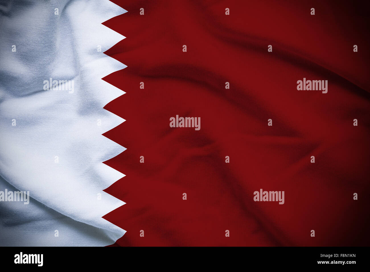 Wavy and rippled national flag of Qatar background Stock Photo - Alamy