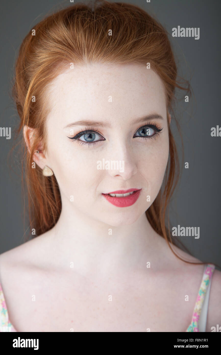 Portrait of a beautiful redheaded woman Stock Photo - Alamy