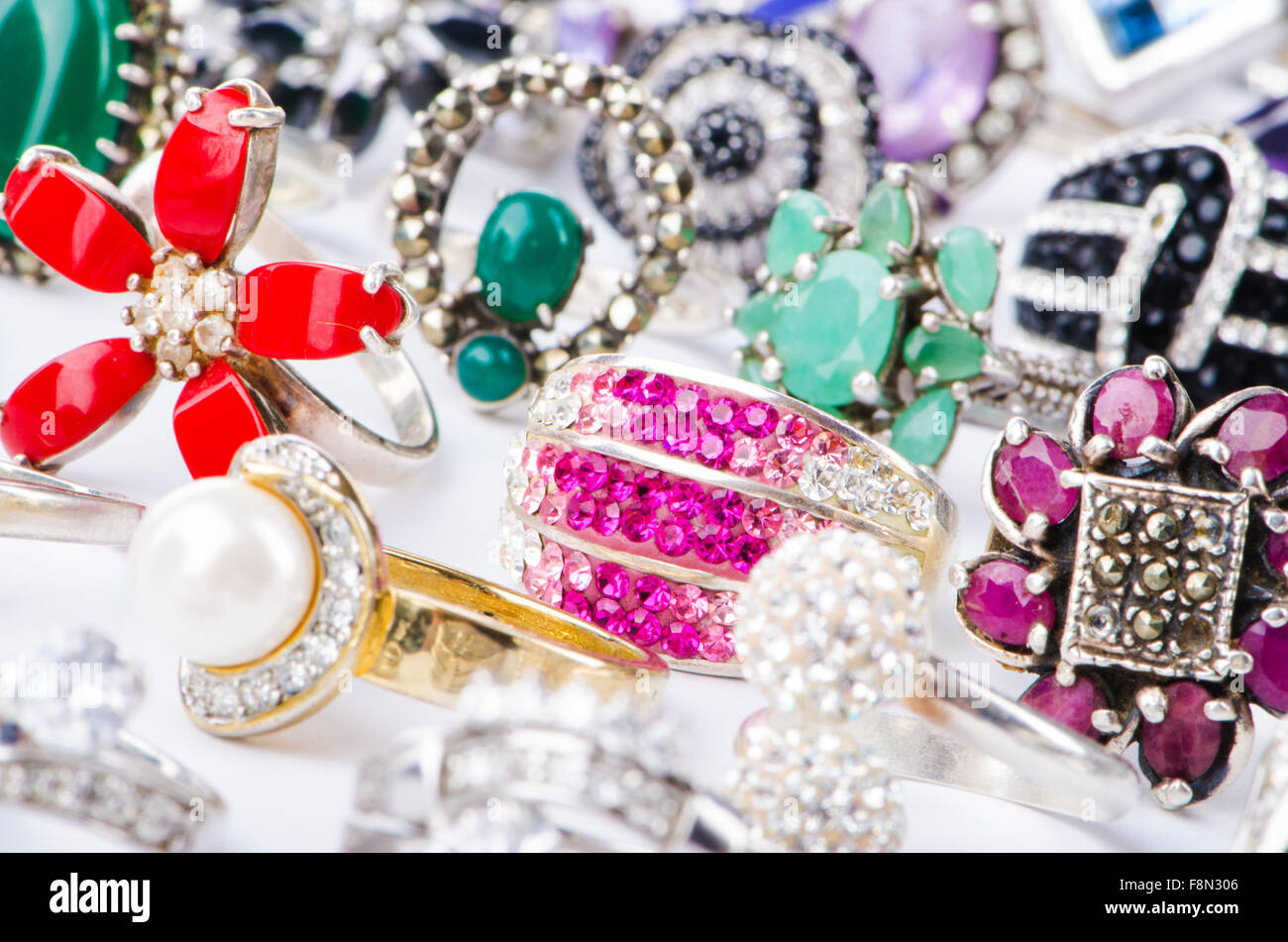 Collection of jewellery rings on white Stock Photo - Alamy