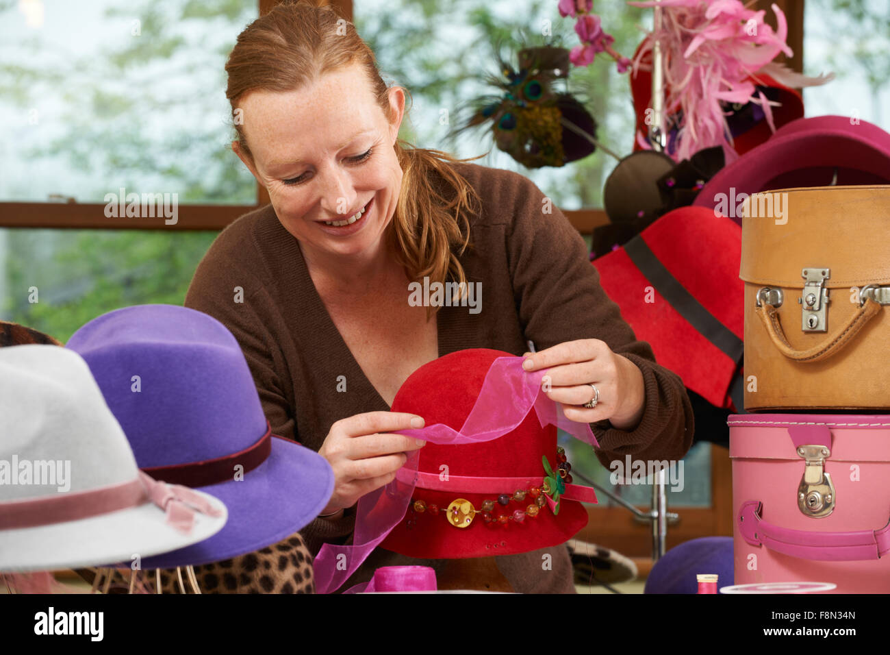 Hat Maker Working On Design In Studio Stock Photo - Alamy