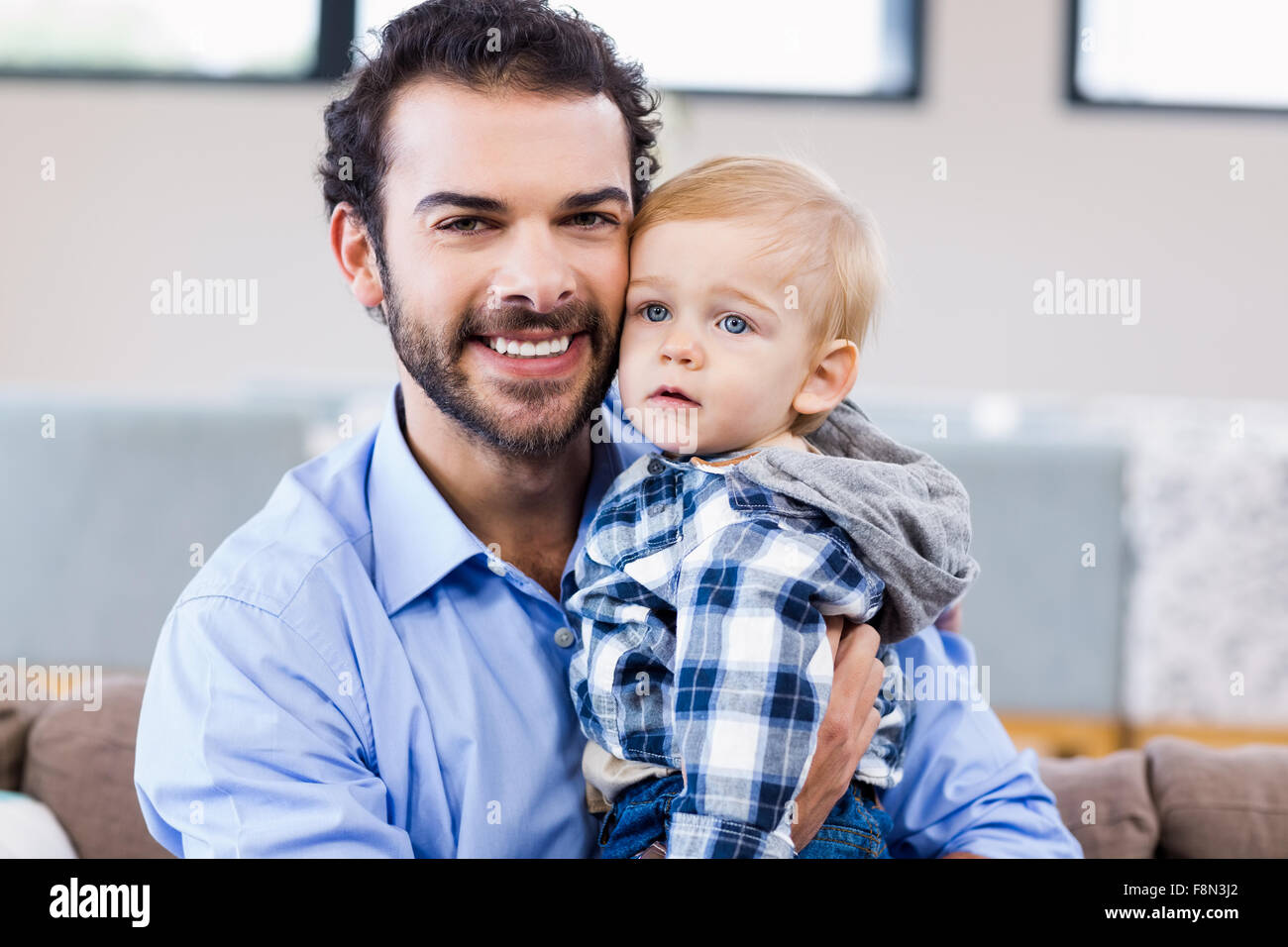 Handsome man with child Stock Photo - Alamy