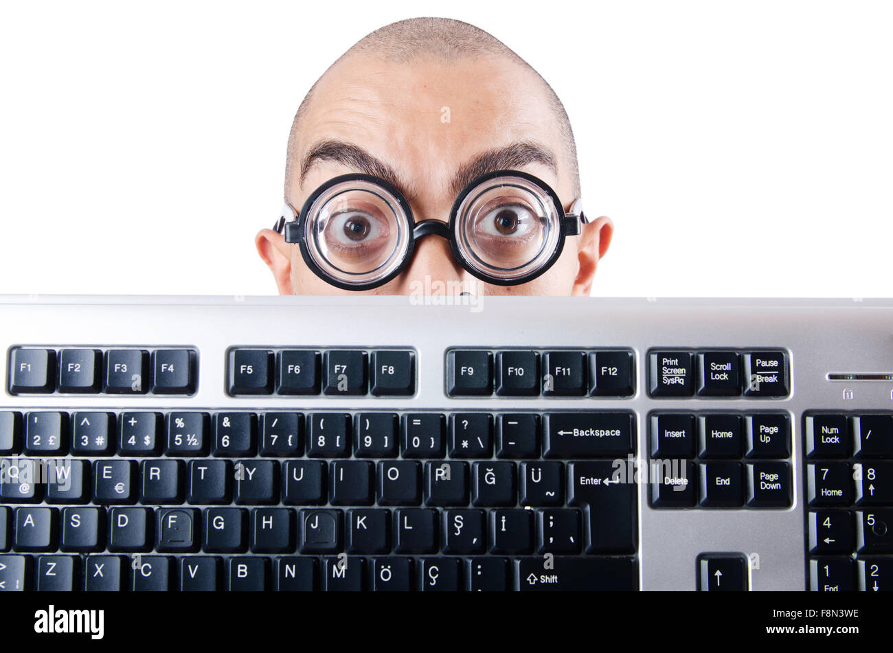 Nerd businessman with computer keyboard on white Stock Photo - Alamy
