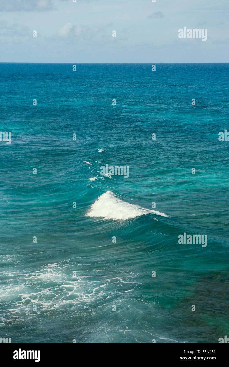 Small wave in the Caribbean Sea off the coast of Isla Mujeres, Mexico ...
