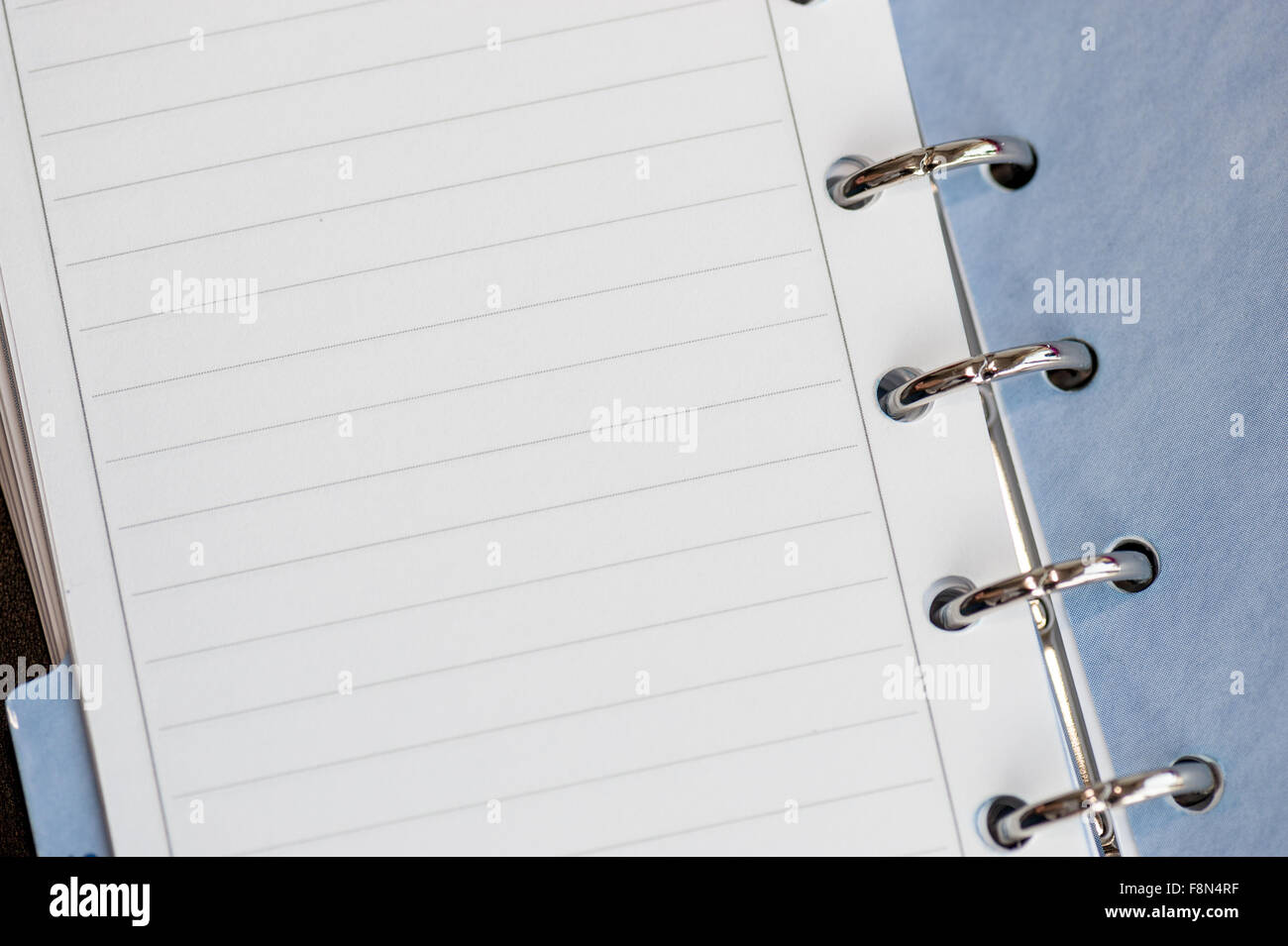 Note paper in clipped book Stock Photo - Alamy