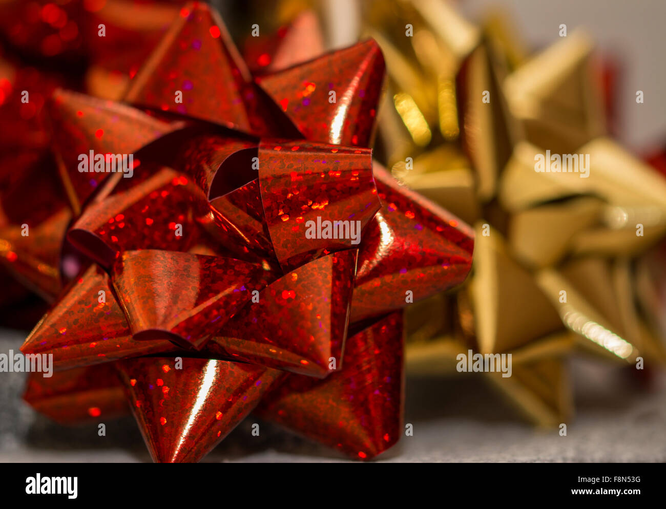 Close up on a red christmas gift bow Stock Photo - Alamy