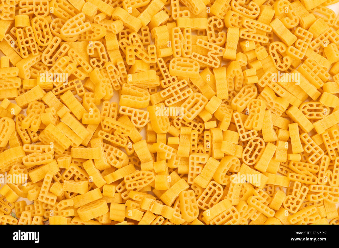 Close up of italian pasta - alphabet shaped Stock Photo - Alamy