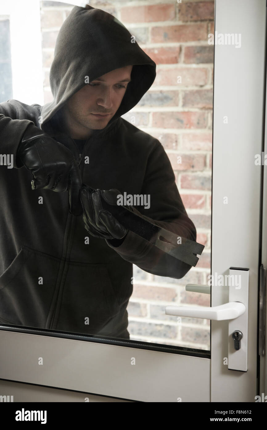 Man criminal crowbar house hi-res stock photography and images - Alamy