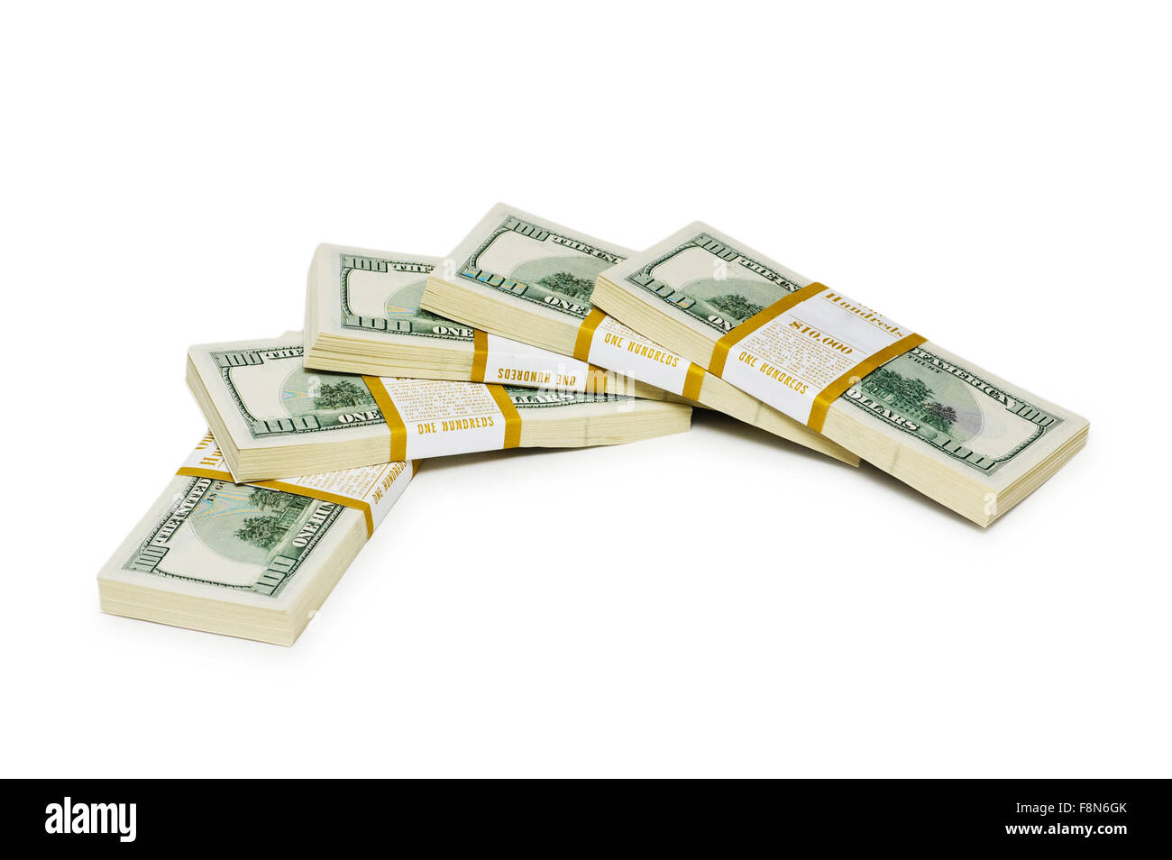 Ten thousand dollar stacks on the white Stock Photo - Alamy