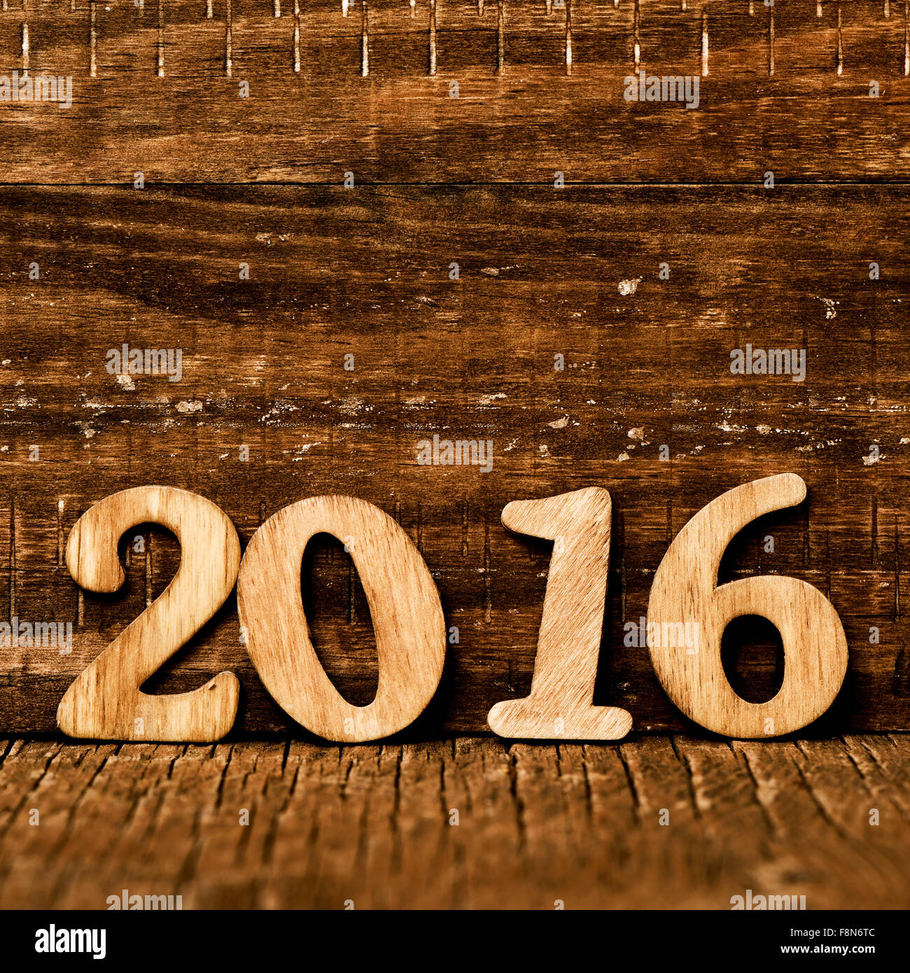 wooden numbers forming the number 2016, as the new year, on a rustic ...