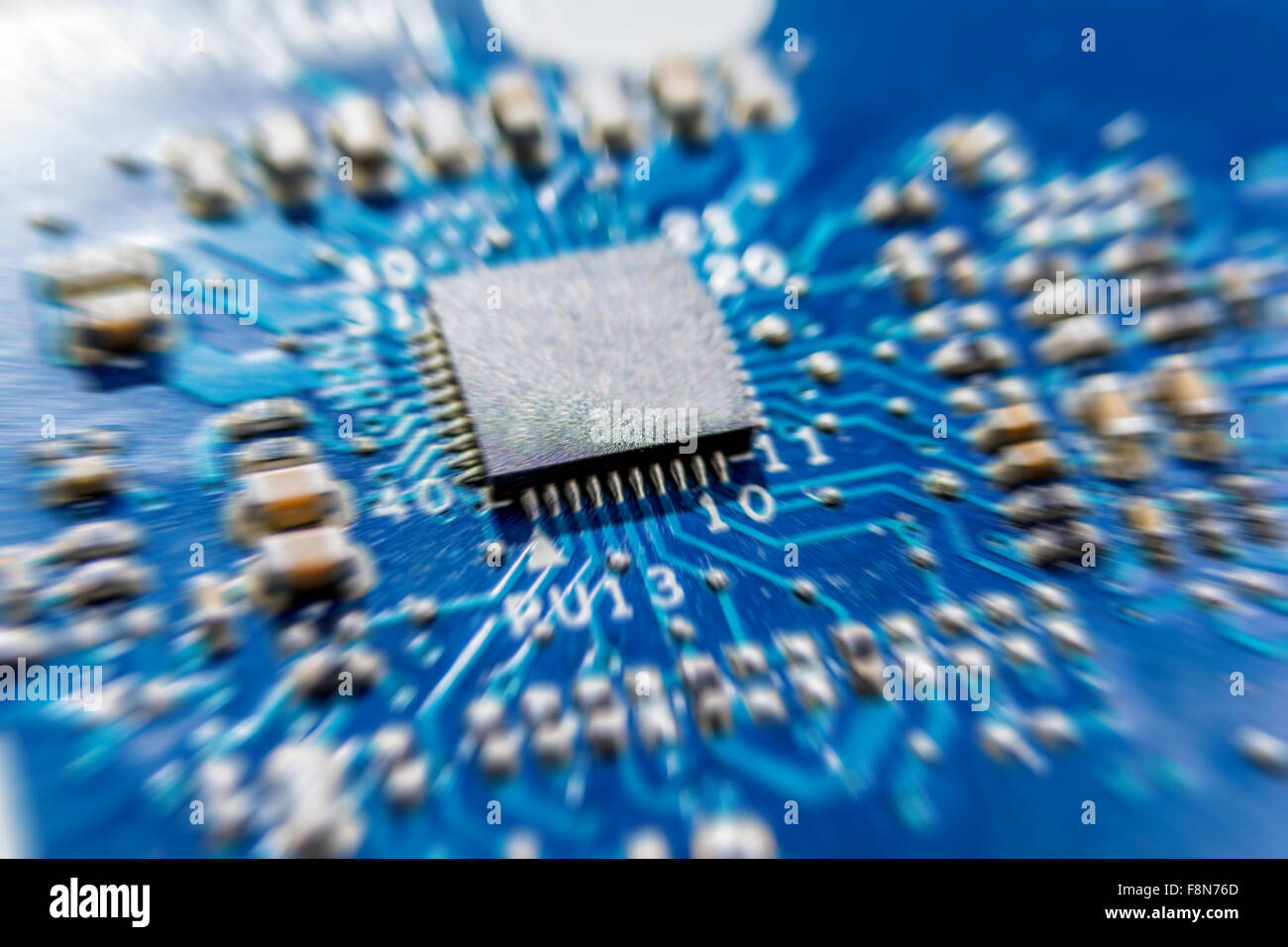 Blue electronic circuit board circle blur close up photography Stock ...