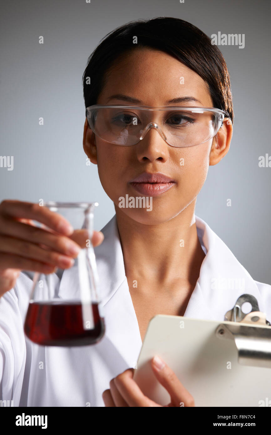 Female scientist laboratory beaker hi-res stock photography and images ...