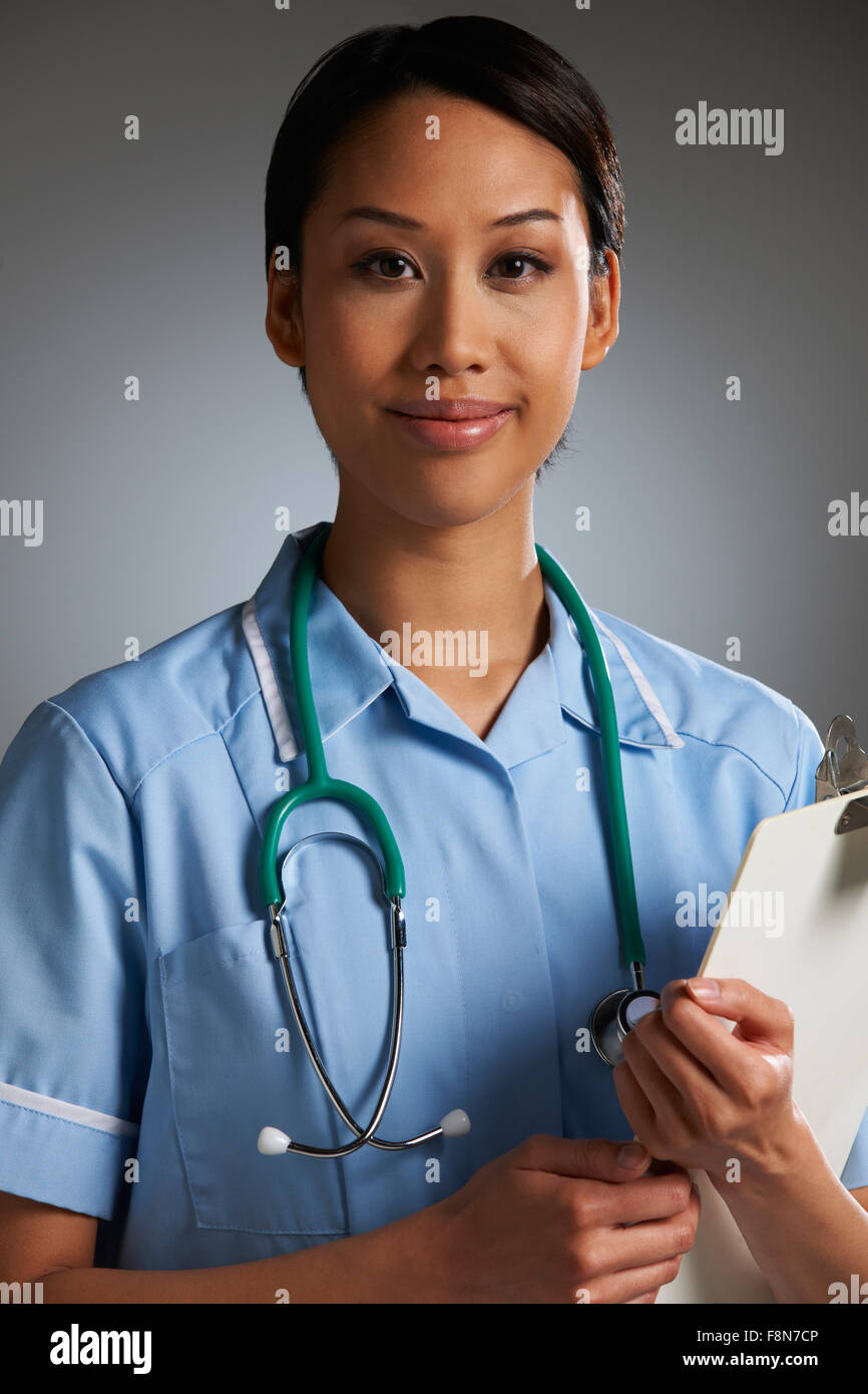Vertical portrait shot smiling nurse hi-res stock photography and ...