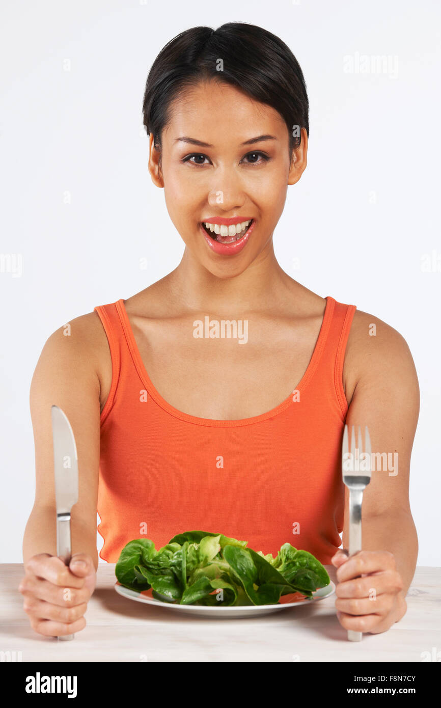 Woman sitting on leaves hi-res stock photography and images - Alamy