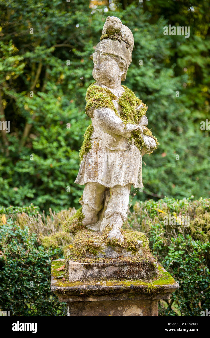 Large garden statue of man in wall Stock Photo - Alamy