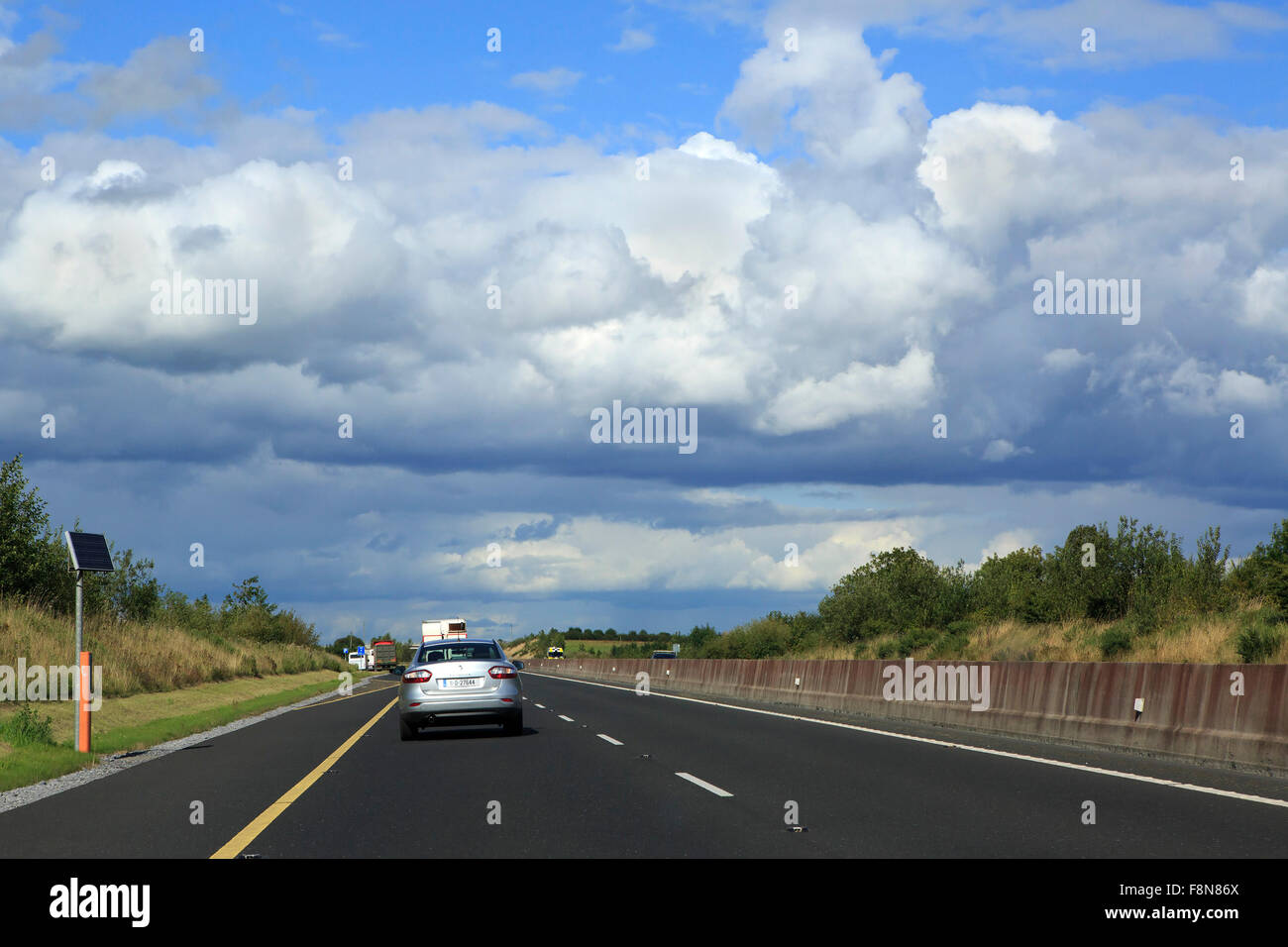 Beautiful Storm clouds over country roads in Ireland Stock Photo - Alamy