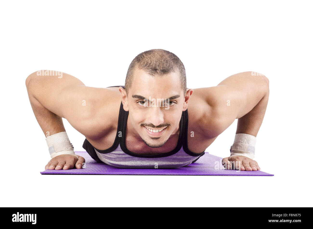 Man doing exercises on white Stock Photo - Alamy