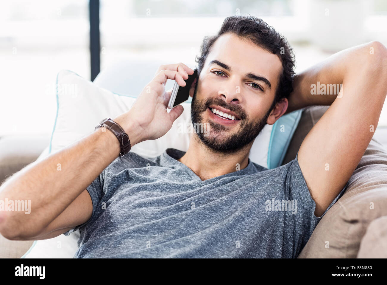 Attractive man on phone call Stock Photo - Alamy