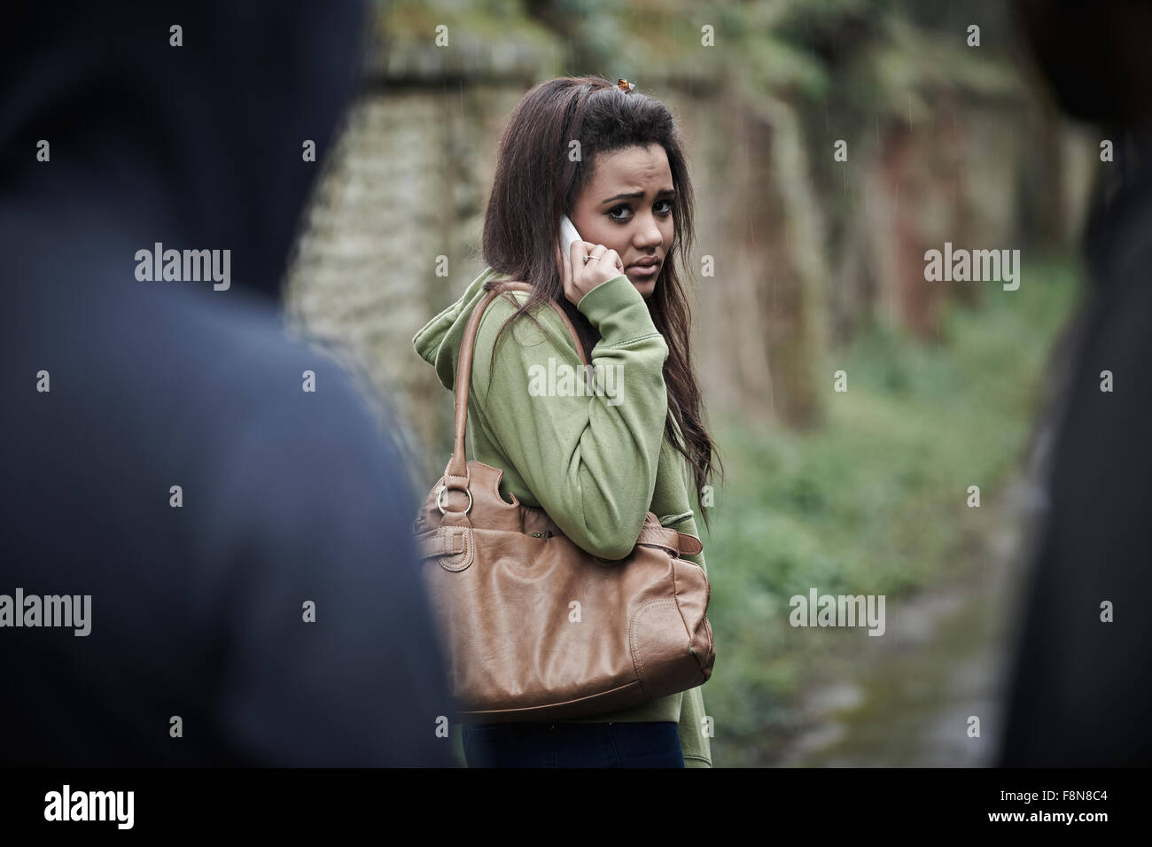Teenage Girl Feeling Intimidated As She Walks Home Stock Photo - Alamy