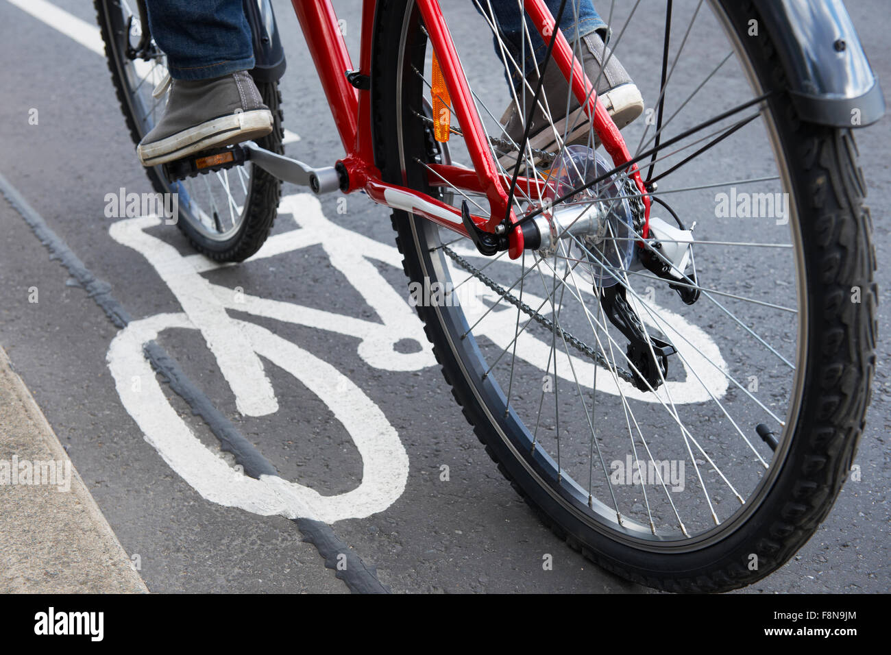 Person riding bike past hi-res stock photography and images - Alamy