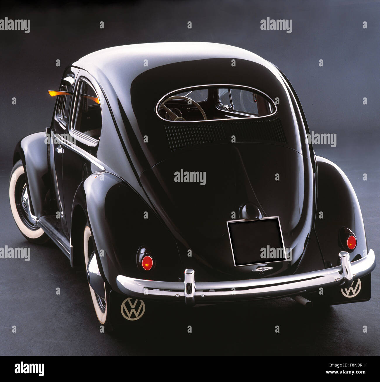 Black Volkswagen Beetle from rear in studio Stock Photo - Alamy