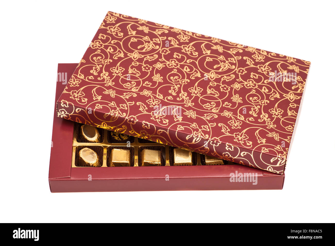 Box of chocolate candies isolated on white Stock Photo - Alamy