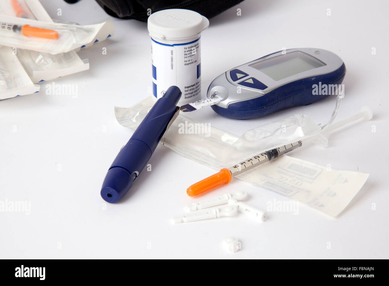 Diabetes testing equipment on a white background Stock Photo - Alamy