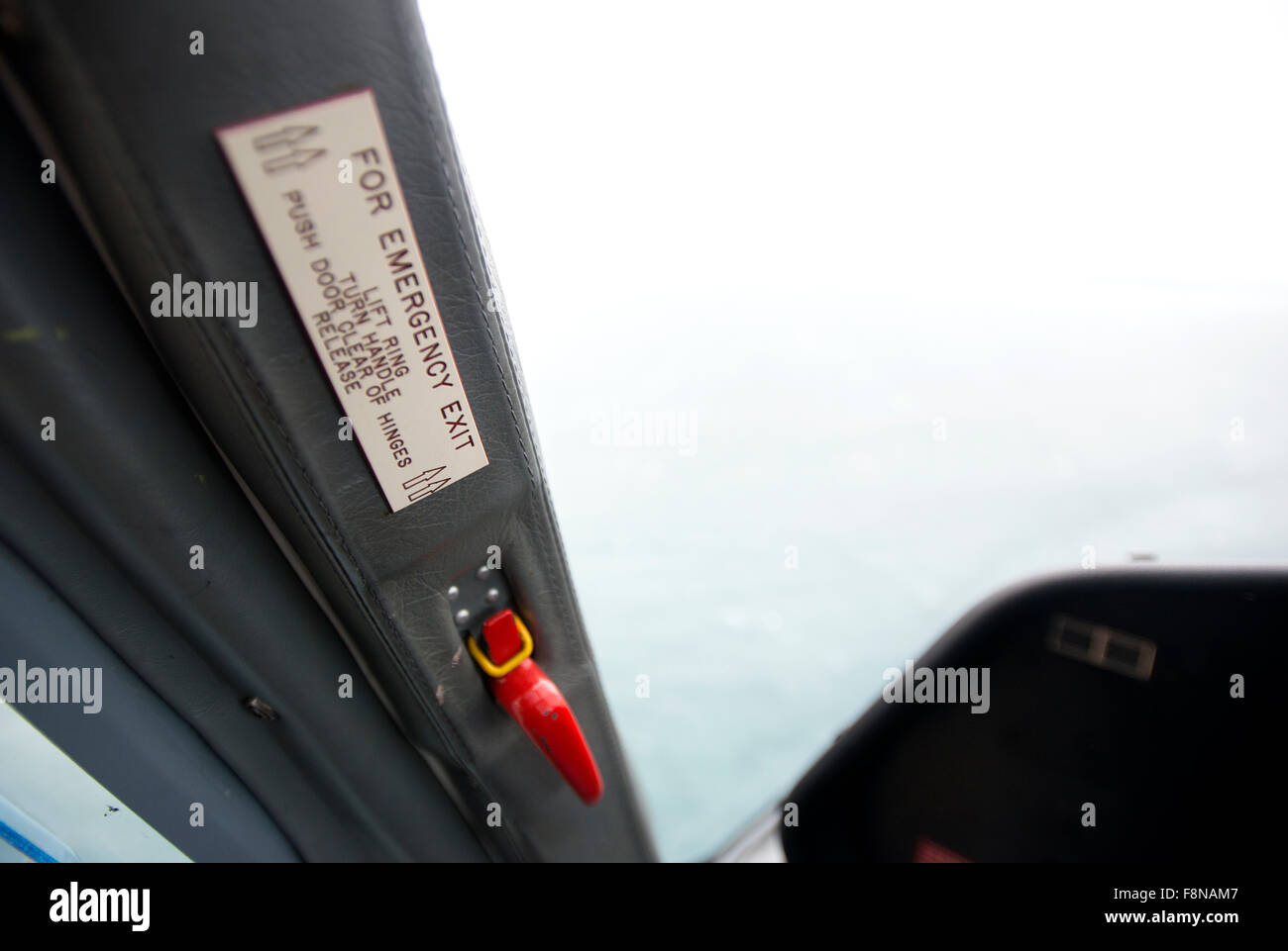 Emergency exit in a helicopter cockpit, on the shuttle flight to Lundy ...