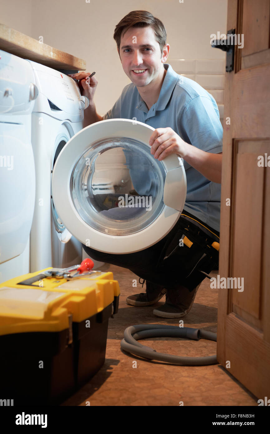 Engineer Mending Domestic Washing Machine Stock Photo - Alamy