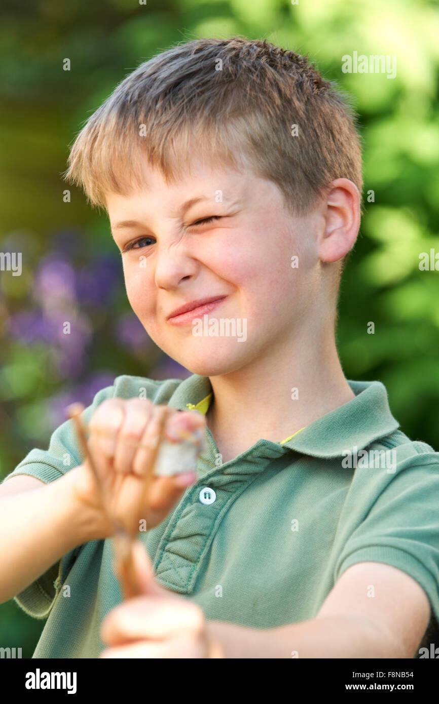 Boy slingshot hi-res stock photography and images - Alamy