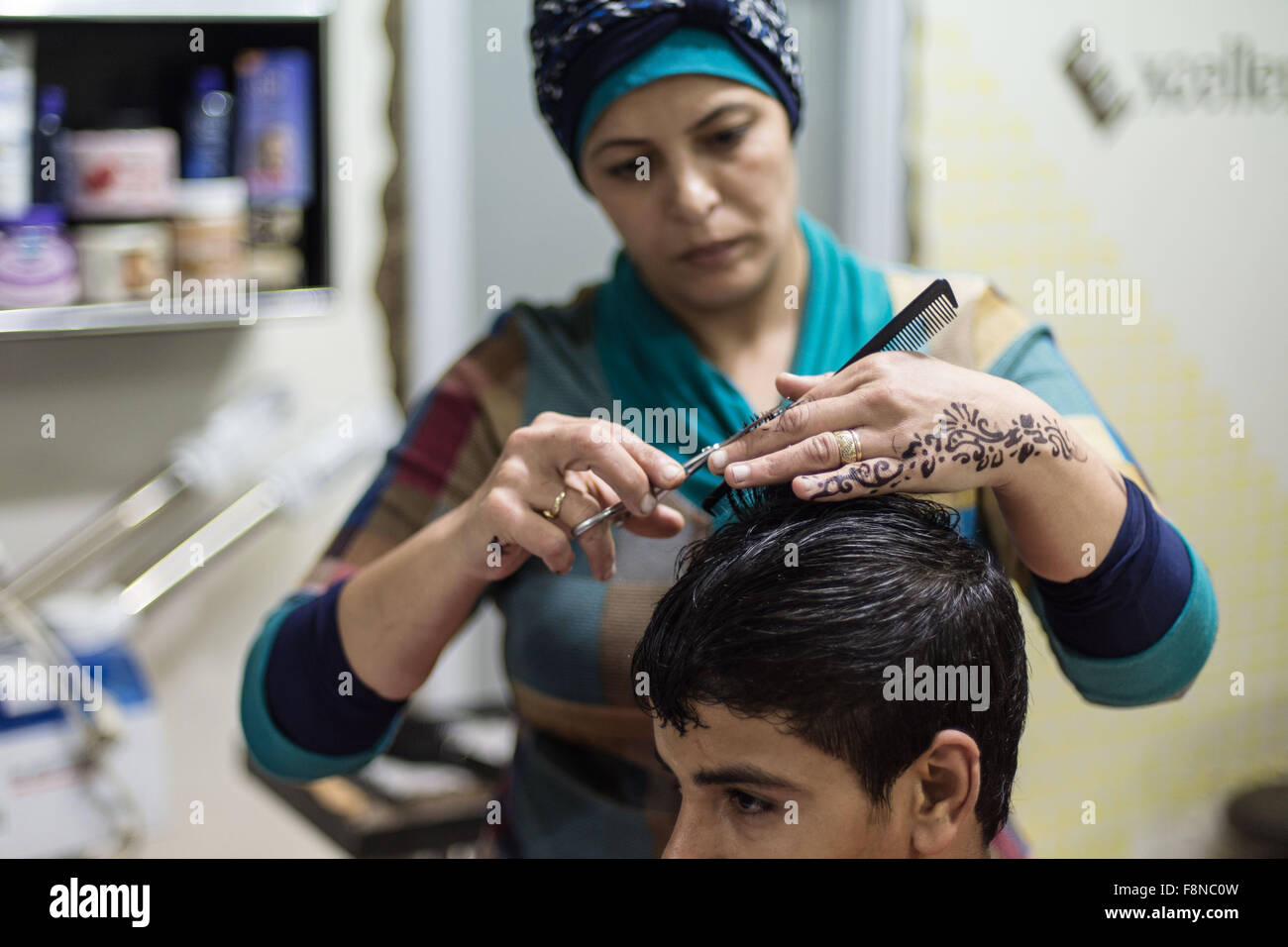 Cairo, Egypt. 10th Dec, 2015. Abeer Mahmoud, 43, an Egyptian female ...
