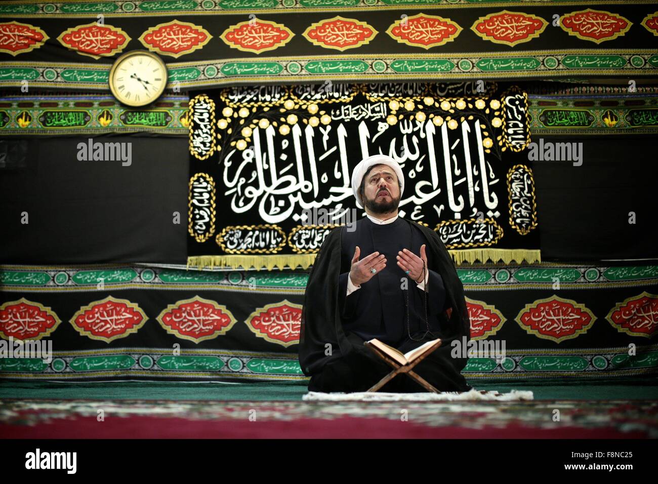 Dearborn, Michigan, USA. 8th Dec, 2015. Imam HUSHAM AL-HUSAINY prays at ...