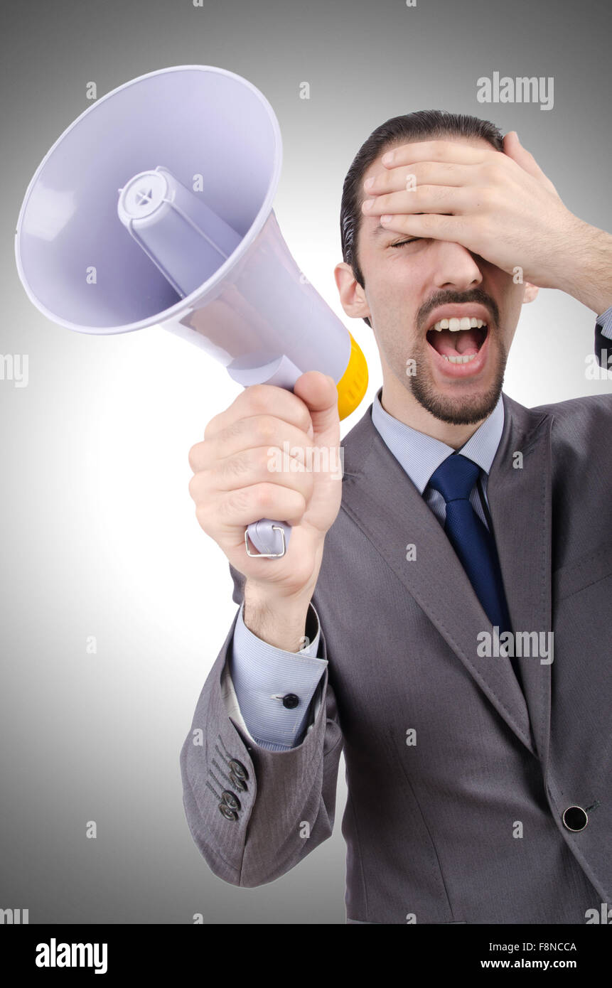 Man shouting and yelling with loudspeaker Stock Photo - Alamy