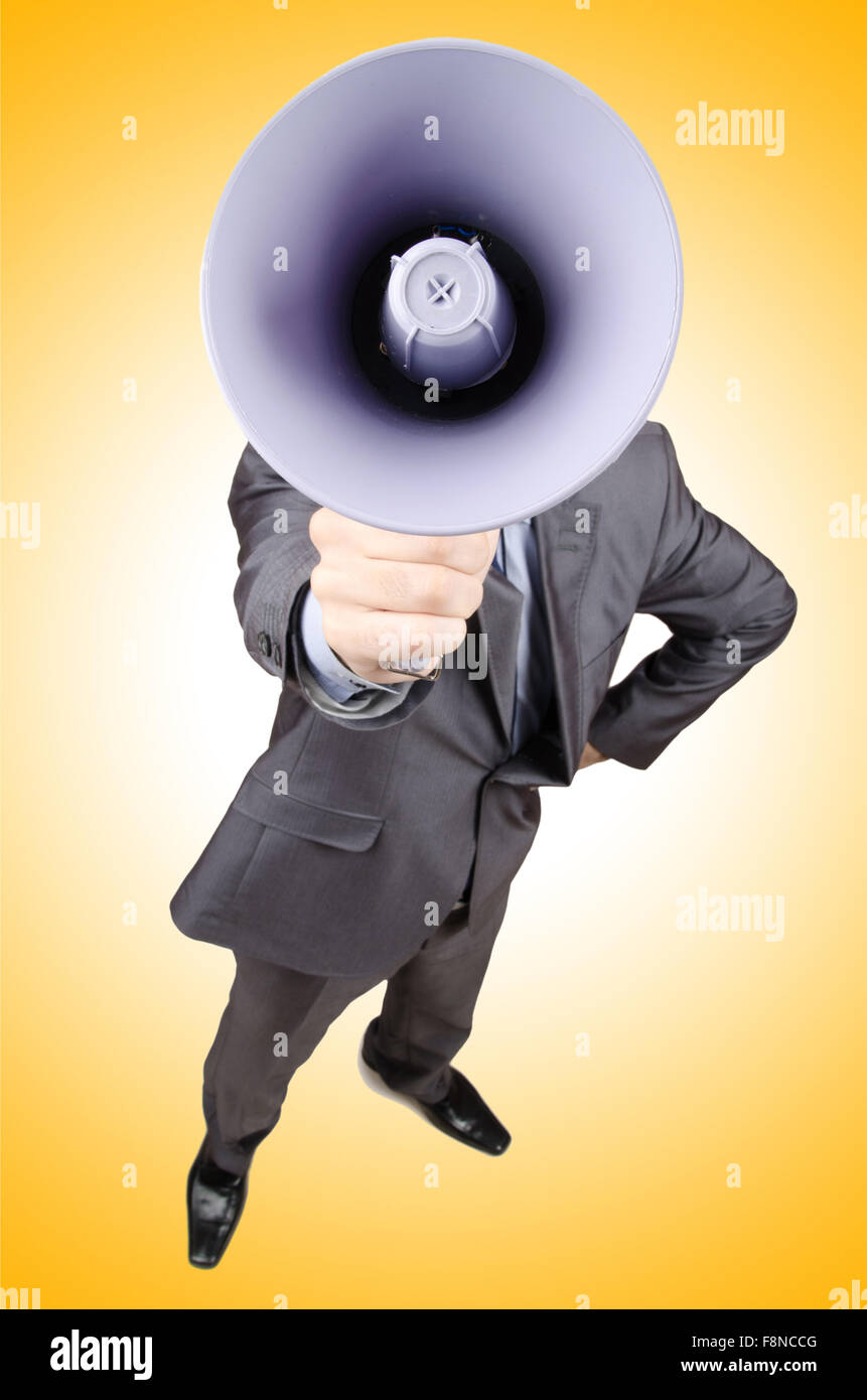 Man shouting and yelling with loudspeaker Stock Photo - Alamy