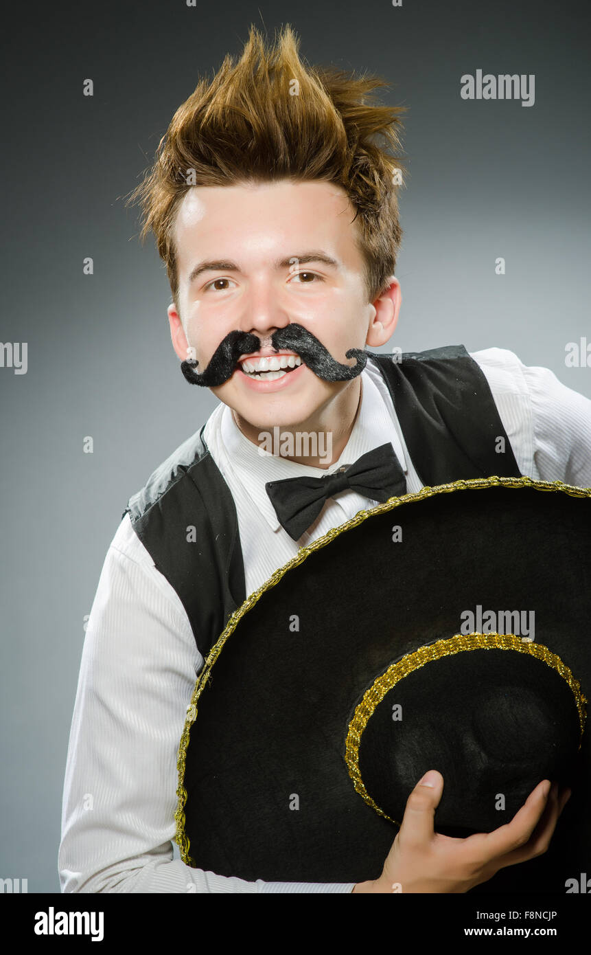 Smiling mexican with sombrero isolated on white Stock Photo - Alamy